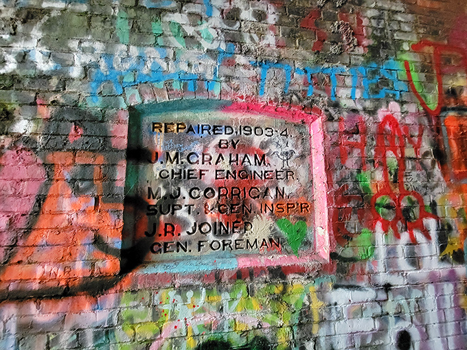 History etched in stone&mdash;or rather, brick. This 1903 repair marker stands as a testament to craftsmanship that's outlasted the very purpose it was built to serve.