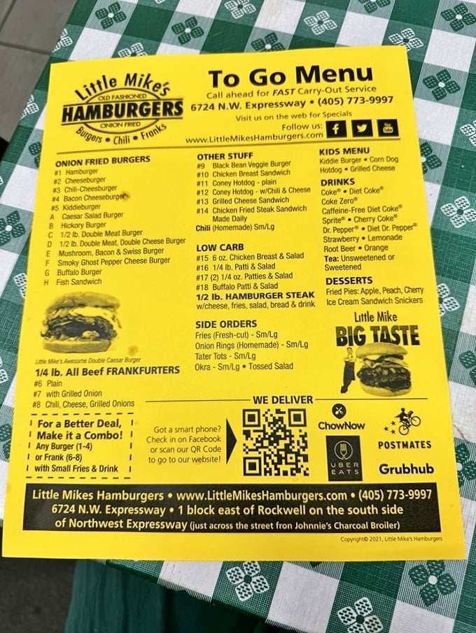 A menu that doesn't need a translator or a loan officer. Yellow paper, black text, and promises of onion-fried bliss.