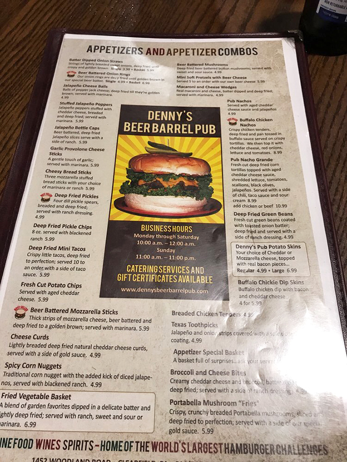The menu reads like a manifesto for indulgence, with appetizers that could feed a family and burgers that require engineering degrees.