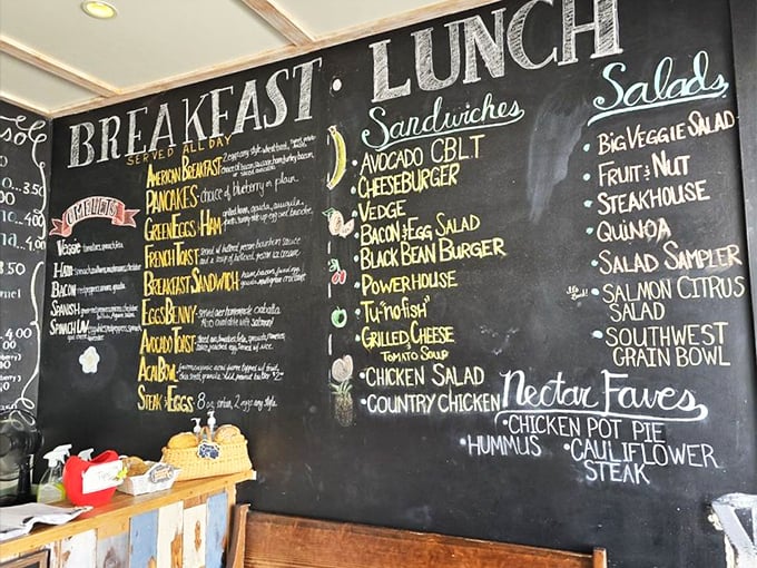 That chalkboard menu isn't just informative&mdash;it's performance art with a side of breakfast options. The colorful handwriting practically sings "order me" from across the room. 