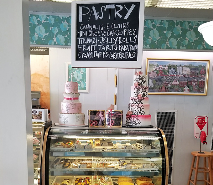 The chalkboard menu reads like poetry for the sweet-toothed—cannolis, eclairs, and fruit tarts competing for your attention and stomach real estate.