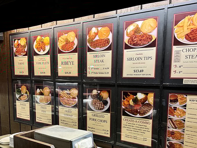 The menu board at York isn't just a list&mdash;it's a gallery of possibilities, each illuminated photo promising a journey back to when steakhouses ruled American dining.