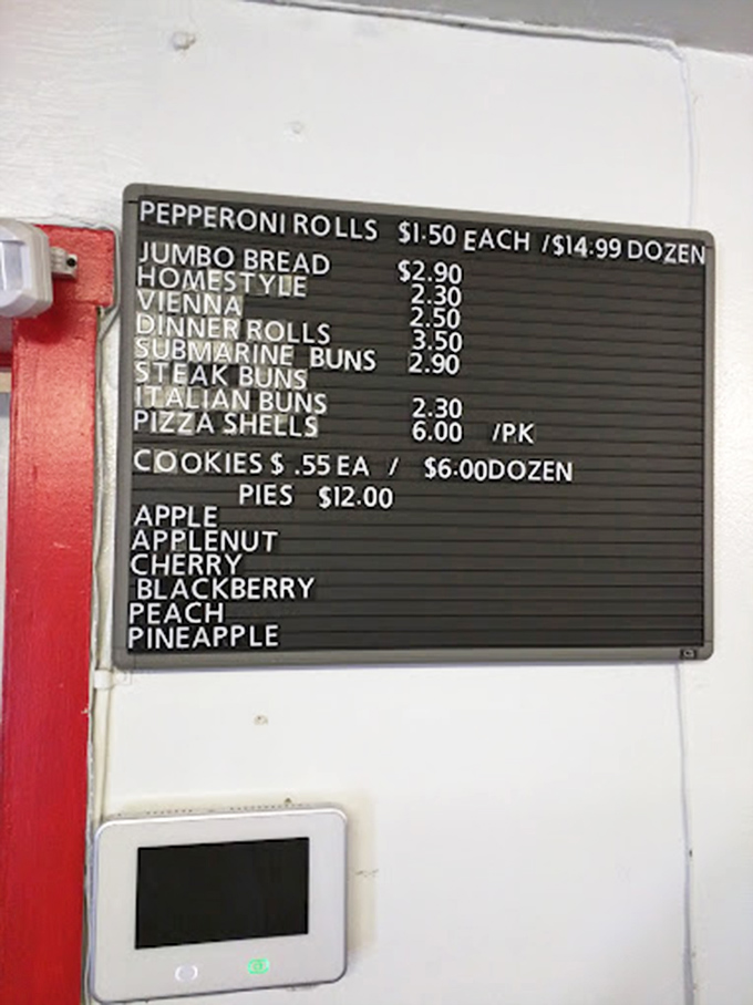 A menu board that cuts right to the chase. No fancy descriptions needed when you've perfected your craft over decades of dough-slinging excellence.
