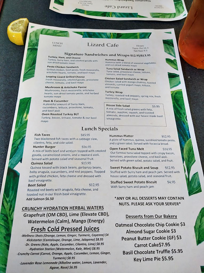 A menu bordered in tropical greens promises culinary adventures from gourmet sandwiches to fresh-pressed juices&mdash;decisions, decisions!