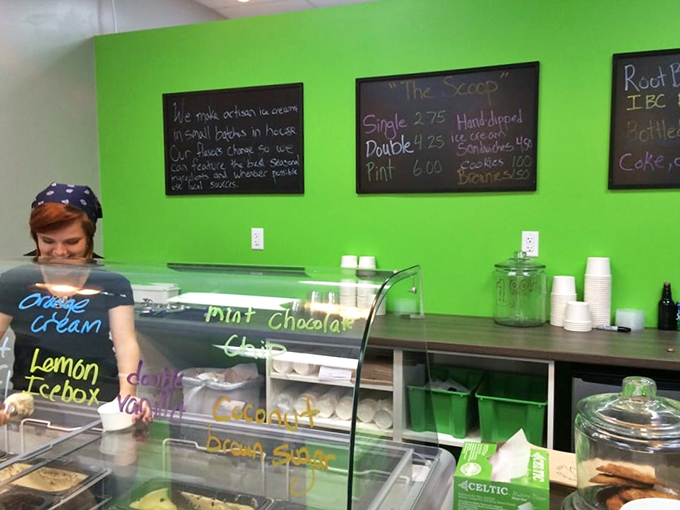 The vibrant green wall and handwritten menu board showcase the day's flavors. Like a treasure map to frozen happiness, each chalk-scrawled option promises adventure. 