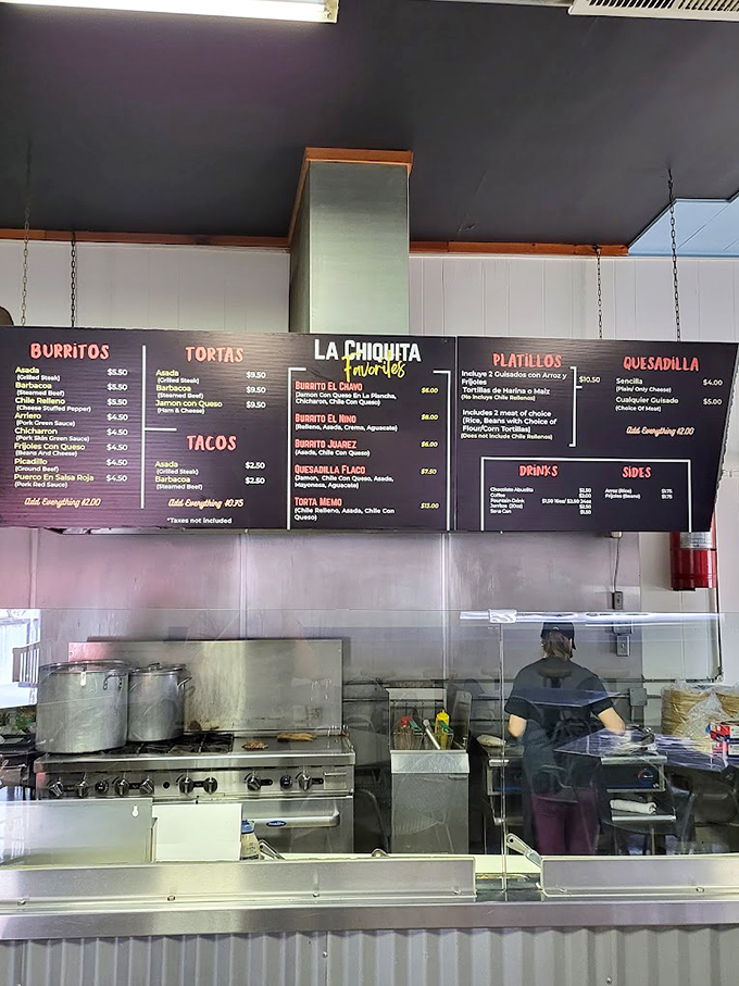 The menu board tells the whole delicious story. Like a culinary roadmap to happiness, it guides hungry pilgrims to their perfect Mexican meal match.