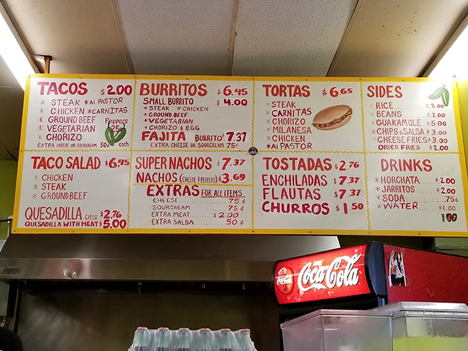 The holy scripture of Mexican street food. This hand-lettered menu board has launched a thousand cravings and ended countless hunger emergencies.