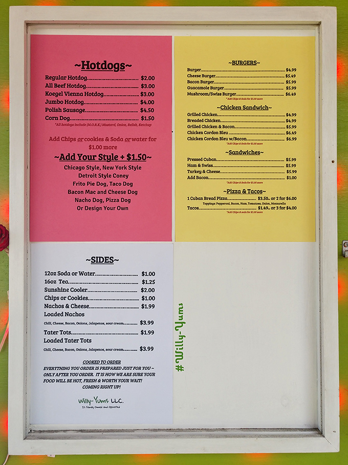 This menu board is like a roadmap to happiness. The pink and yellow sections offer a tour of regional hot dog styles that would make a food historian weep with joy.
