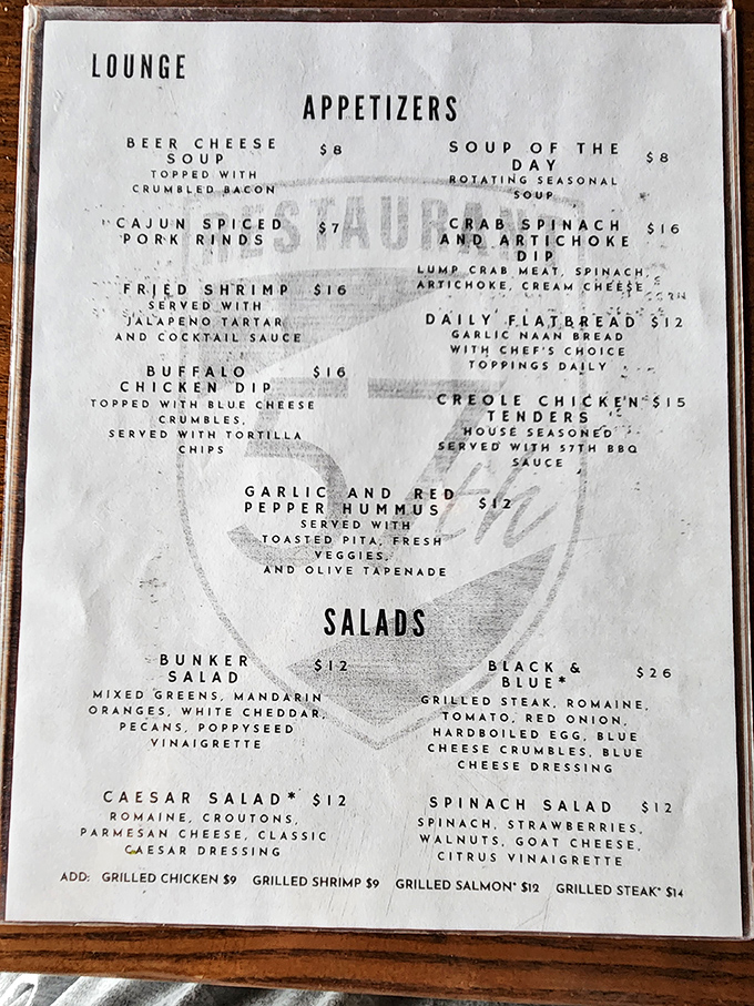 The menu reads like a battle plan for your taste buds, with beer cheese soup and crab spinach dip serving as delicious opening salvos.