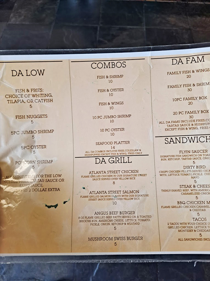 The menu reads like a love letter to seafood enthusiasts. "Da Low" to "Da Fam"&mdash;they've got portions for every appetite.
