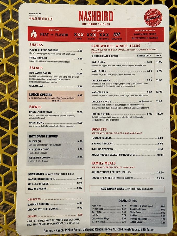 The menu board—a roadmap to flavor paradise. Choose your heat level wisely; your taste buds will either thank you or never speak to you again.