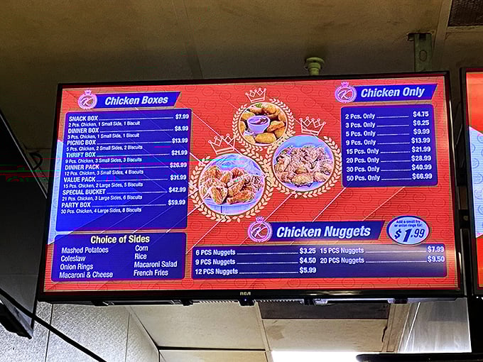 The digital menu board glows with chicken possibilities &ndash; from individual pieces to family-sized feasts that could feed a Little League team.