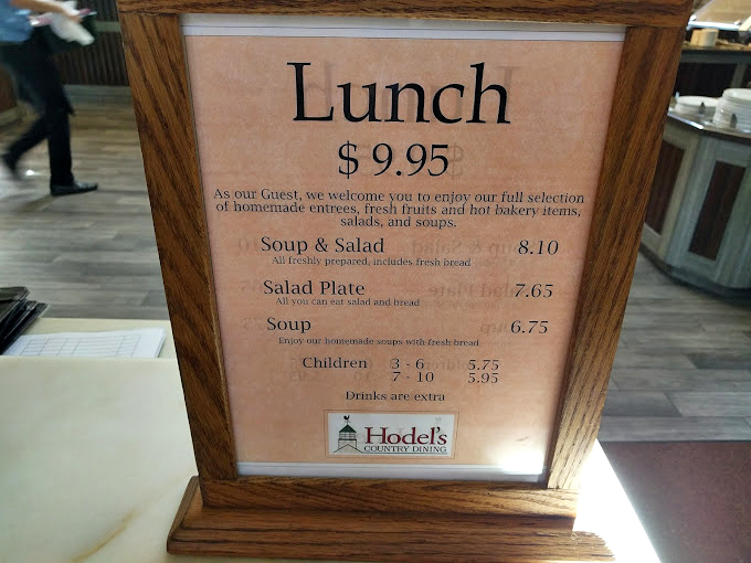 A menu board that belongs in a museum of American affordability. When was the last time you saw lunch prices that didn't require a second mortgage?