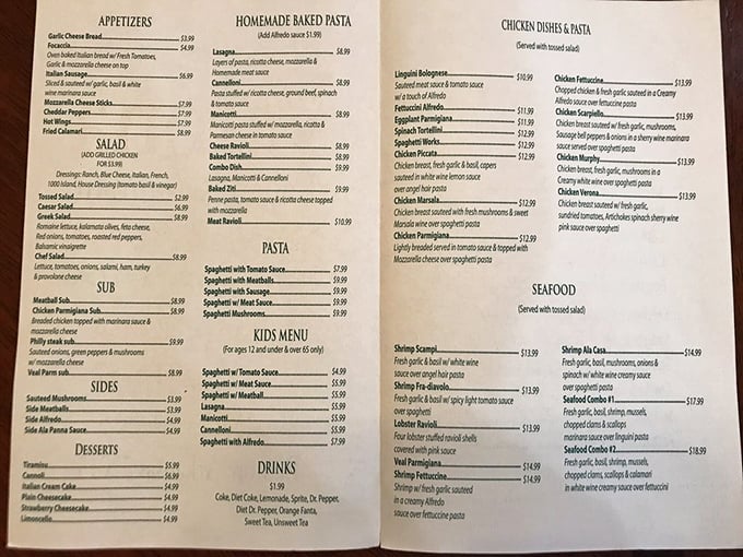 This menu reads like a love letter to Italian-American classics. I've seen religious texts studied with less devotion than regulars give this laminated masterpiece.