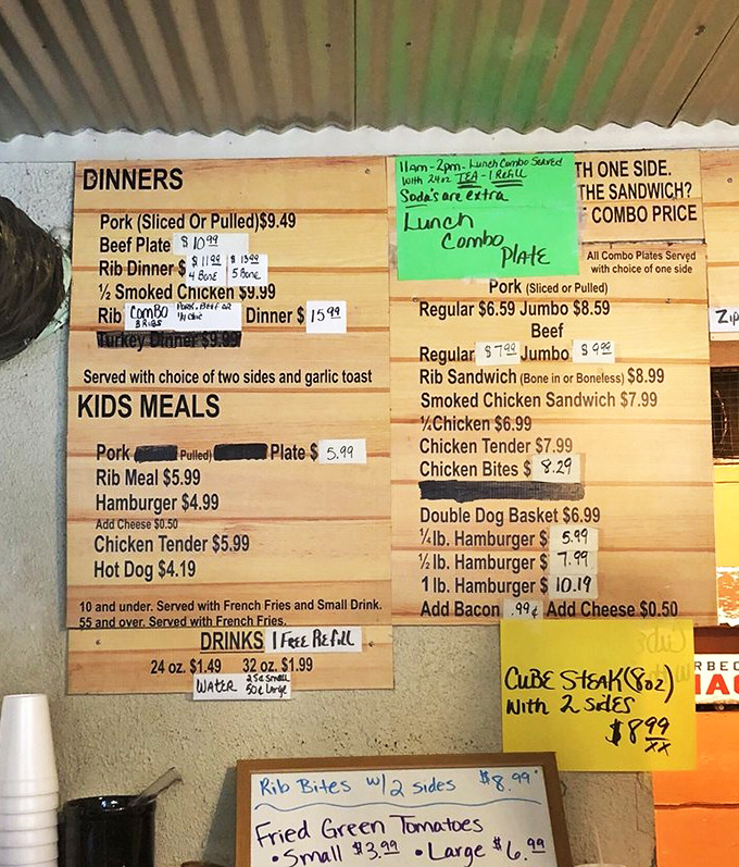 The handwritten menu board speaks volumes: this isn't a place that wastes time on fancy descriptions when they could be smoking more meat.