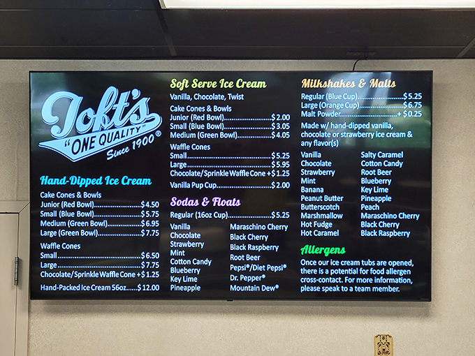 This menu board isn't just listing flavors&mdash;it's offering life choices. The hardest relationship commitment in Sandusky is deciding between hand-dipped and soft serve.