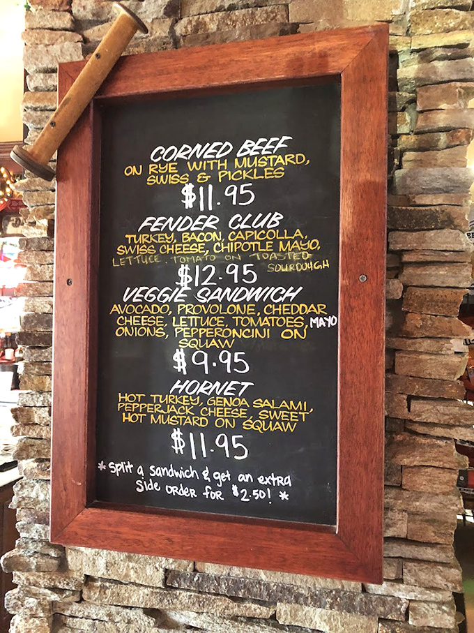 This menu board isn't just listing sandwiches&mdash;it's offering life choices. The "split a sandwich" option is there for the optimists who think they'll have room for dessert.