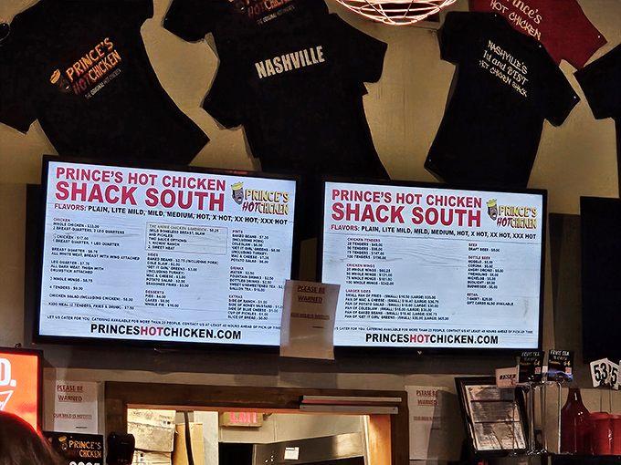 The menu board displays heat levels like a meteorologist's warning system&mdash;from "nice day" Plain to "catastrophic" XX Hot.