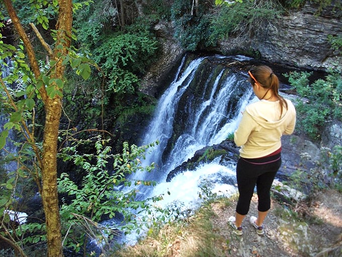 Fall foliage creates nature's perfect frame for cascading water. The autumn colors transform Raymondskill Falls into a painting that would make Bob Ross reach for his happiest little brushes. 
