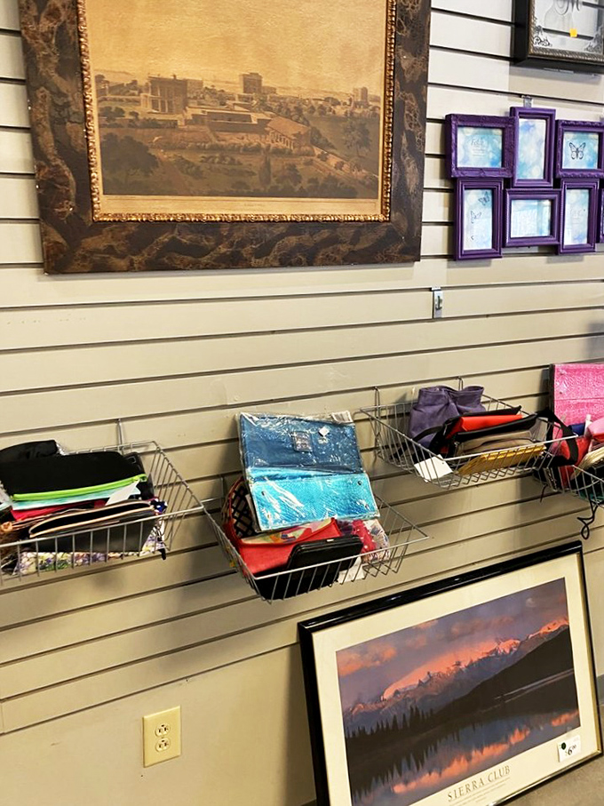 Wall art that tells stories of places you might never visit, alongside neatly organized accessories waiting for their next chapter.