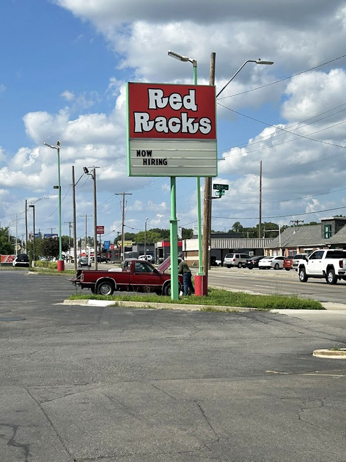 The iconic Red Racks sign stands tall against Missouri skies, a beacon for bargain hunters and nostalgic collectors alike.