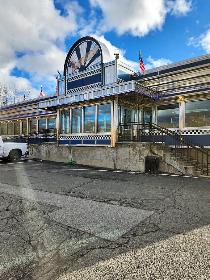 The Blue Colony's diner sign rises majestically against the sky, like the Statue of Liberty for the breakfast-obsessed.