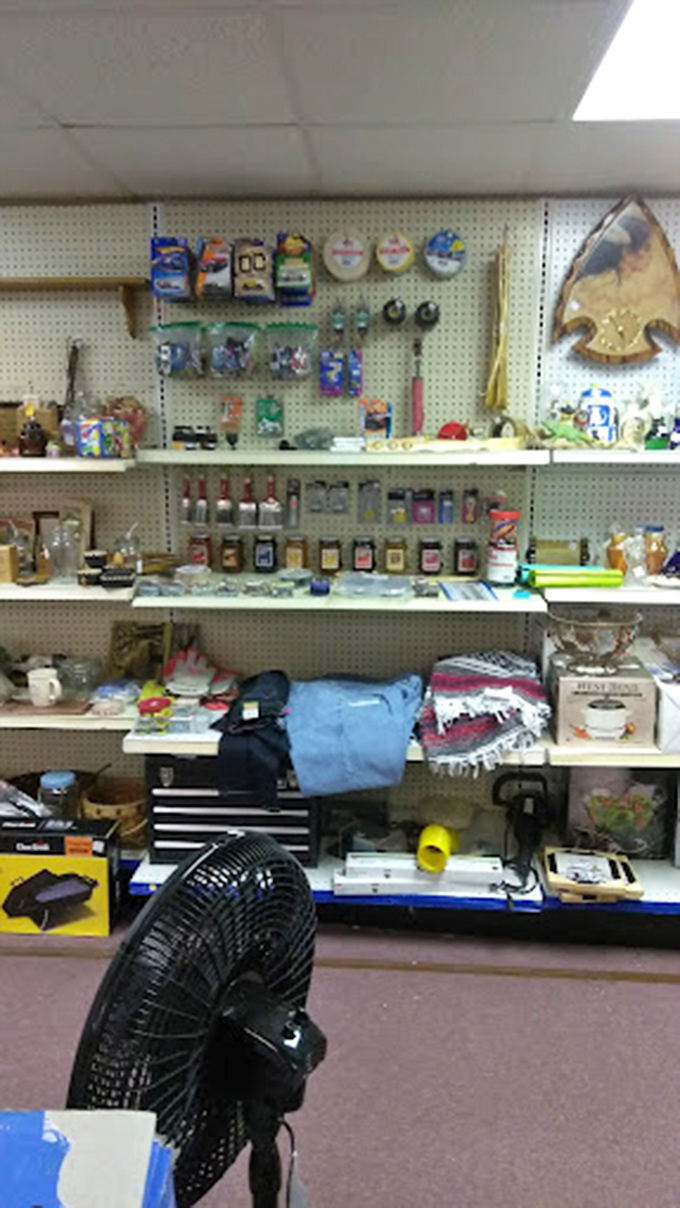 Pegboard paradise! Dixie Treasure's walls hold everything from fishing lures to forgotten family heirlooms.