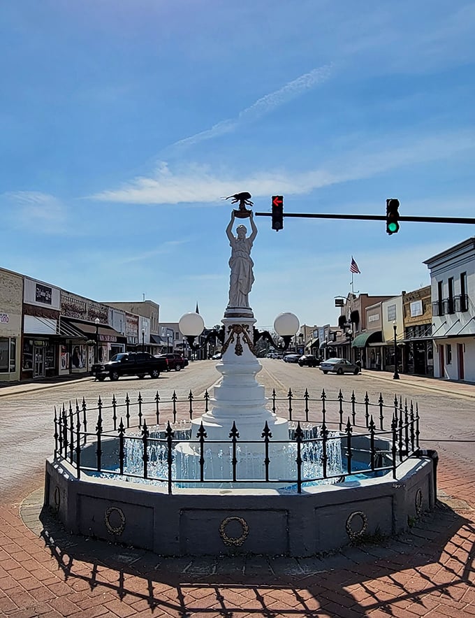 Enterprise's downtown fountain stands proudly, commemorating the only town brave enough to build a monument to a pest. Now that's character!