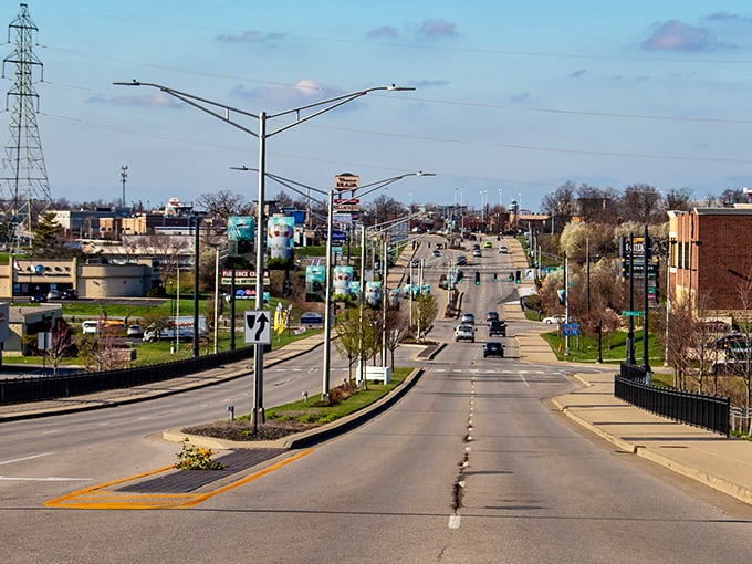 Florence's colorful storefronts stand proudly against blue Kentucky skies, offering charm without the premium price tag.