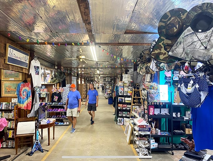 Shoppers browse outdoor displays with the focused determination of detectives—each hoping to solve the case of the perfect find.