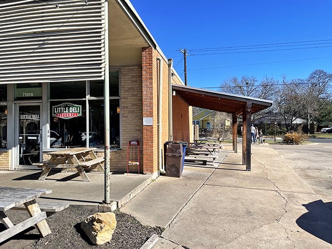 Little Deli's unassuming exterior hides sandwich greatness. Those picnic tables have witnessed countless "first bite" moments of pure joy.