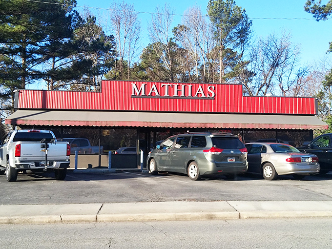 Mathias stands proudly in its crimson glory. This sandwich shrine has converted more taste buds than a televangelist.