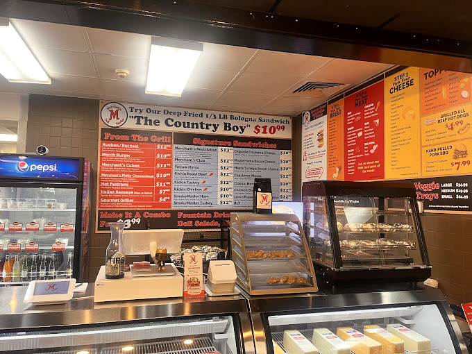 Merchants Deli's menu board reads like a love letter to sandwich perfection &ndash; straightforward, honest, and deeply satisfying.