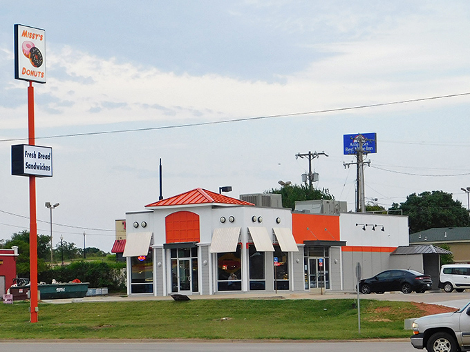 Orange you glad this donut shop exists? Missy's bold exterior stands out like a delicious traffic cone guiding you to breakfast bliss.