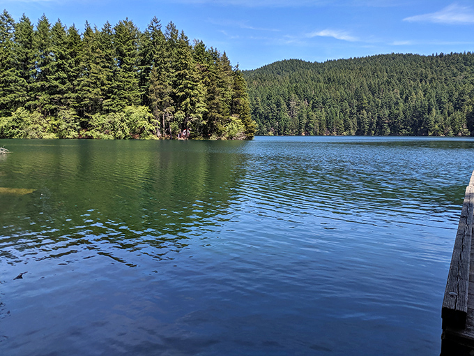 Mountain views worth every step of the climb, with islands scattered below like emeralds on blue velvet.