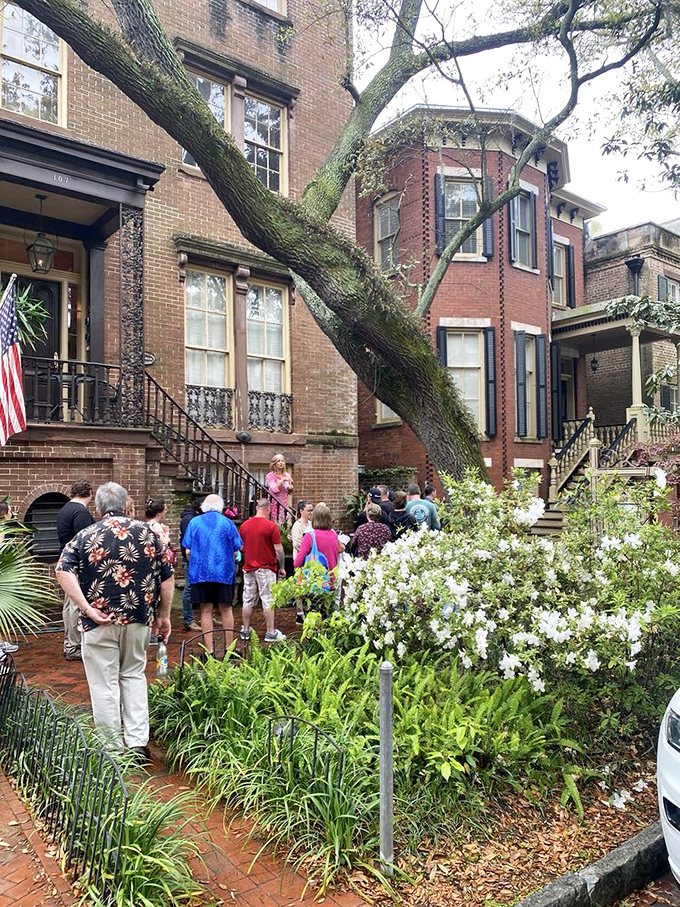 A group gathers outside Mrs. Wilkes', proof that the best things in life are worth waiting for, especially when fried chicken's involved.