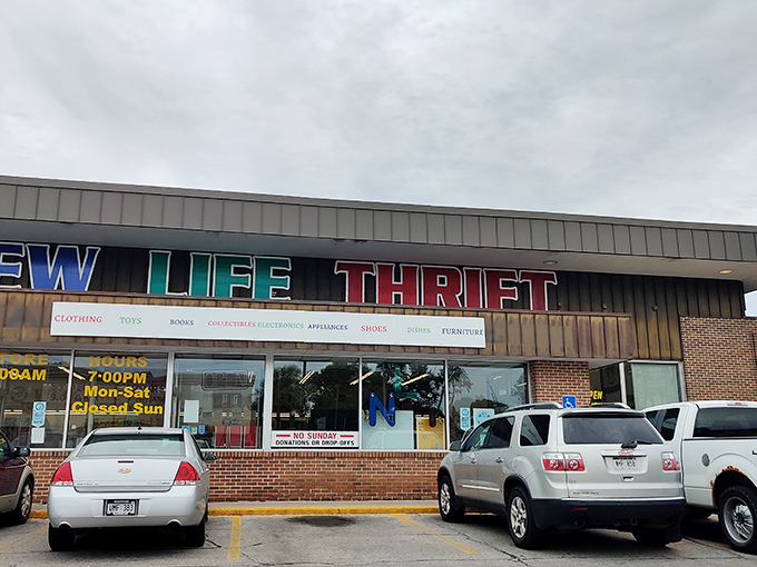 Color-coded thrifting heaven! New Life's vibrant signage promises a rainbow of possibilities for your home and wardrobe. 
