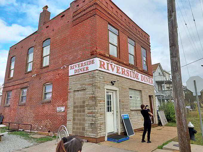 Riverside's sturdy brick facade has weathered decades, just like the cast iron skillets still sizzling inside.