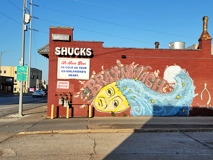 Shucks Fish House: That playful blue fish mural isn't just decoration &ndash; it's a promise of the ocean treasures waiting inside. 