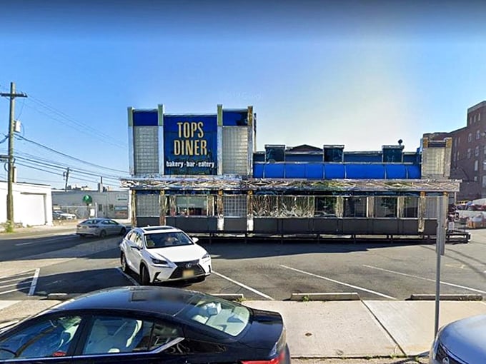 Tops Diner exterior: Space-age diner architecture meets classic Jersey attitude. This isn't just a restaurant &ndash; it's a chrome-plated breakfast temple.