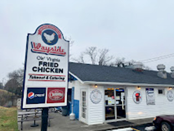 Wayside's "This Chicken Clucks For You" sign might be the most honest advertising in Virginia's culinary landscape.