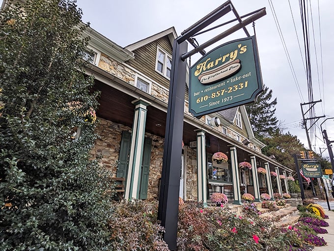 The historic stone facade of Harry's Hotdogs proves that beautiful architecture and comfort food make perfect neighbors. 