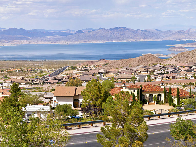 Lake Mead shimmers like a mirage beyond Boulder City's neat neighborhoods &ndash; desert living with a spectacular blue backdrop.