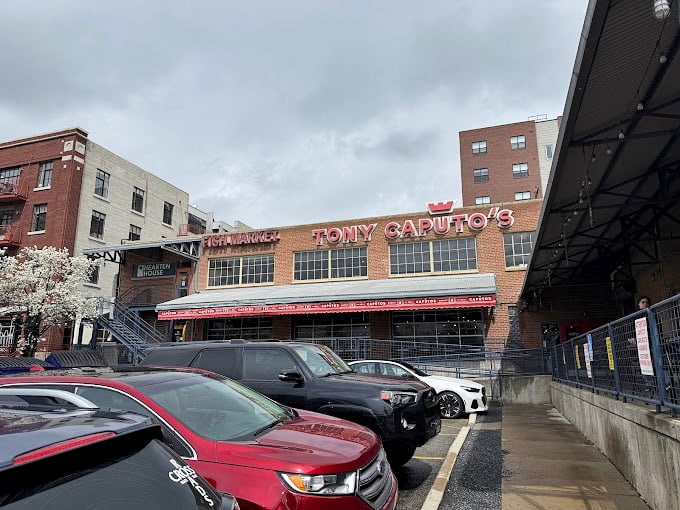 Caputo's red awning serves as a beacon for sandwich seekers, much like the Bat-Signal, but for people with much better lunch plans.