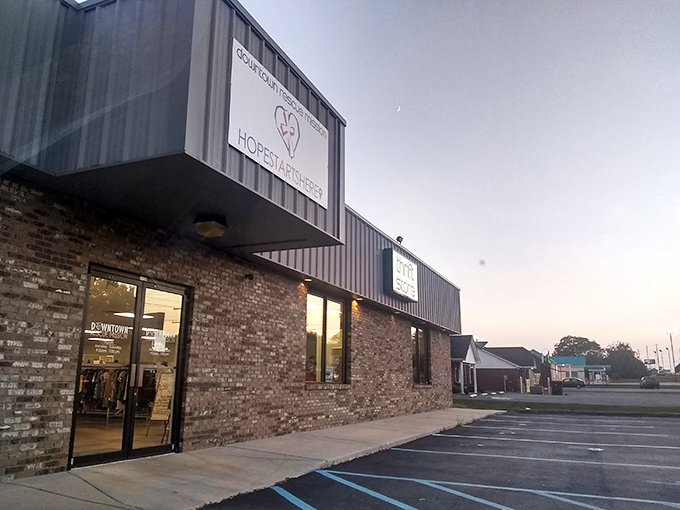 As dusk settles, the Rescue Mission's storefront transforms. Those brick walls hold more secrets than a garage sale detective novel.