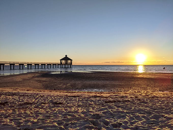 Beach day perfection without airport security. This sandy shoreline proves Louisiana's coastline can compete with postcards.