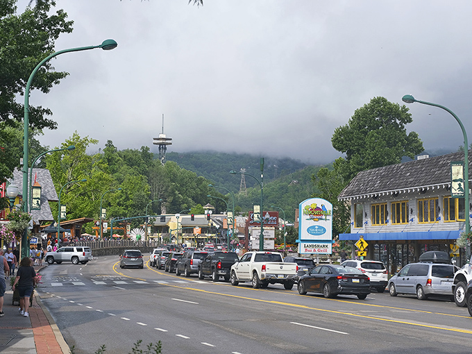 The gateway to the Smokies buzzes with energy, where pancake houses and moonshine tastings compete for your attention.