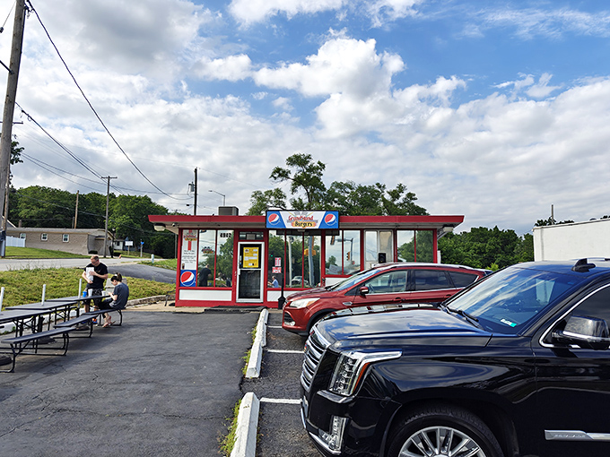 Red trim, simple design, and burgers that make you forget your manners. Grandstand's outdoor seating area is where burger memories are made.