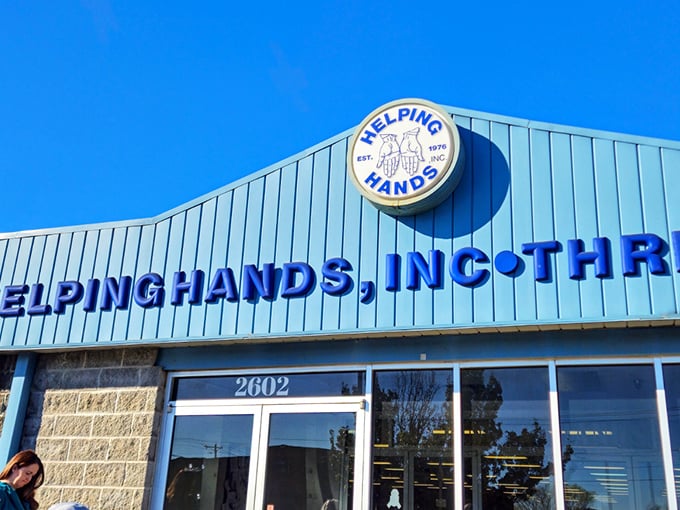 Clear blue skies match the cheerful facade of Helping Hands, where one person's castoffs become another's treasures.