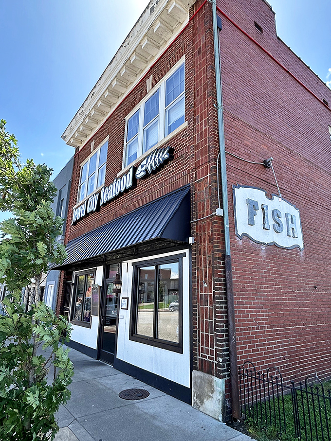 Jewel City daylight view: "That 'FISH' sign is the seafood equivalent of Batman's spotlight&mdash;a beacon calling all hungry heroes to dinner."